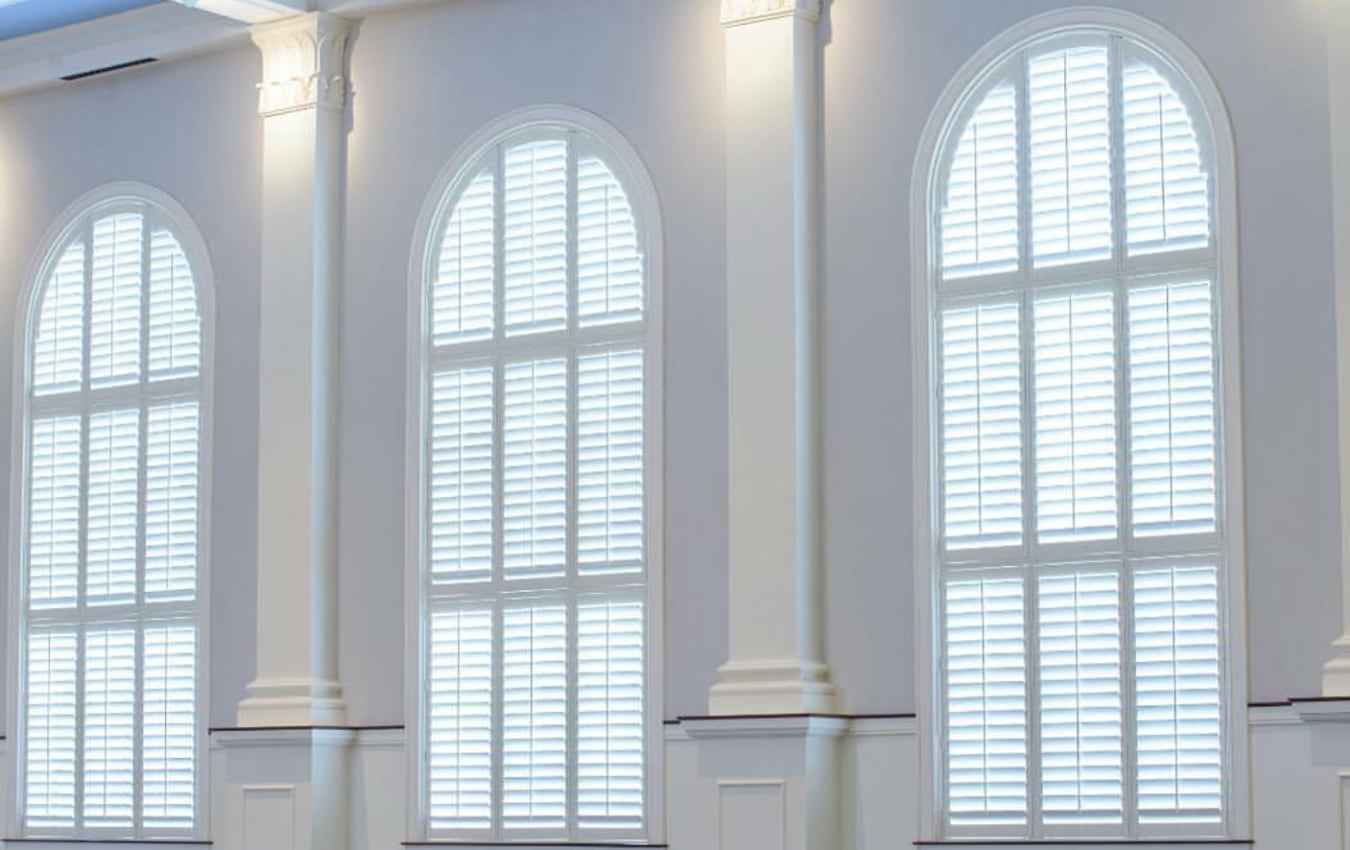 Arch Window Shutters For Commercial Buildings | Sunburst Shutters